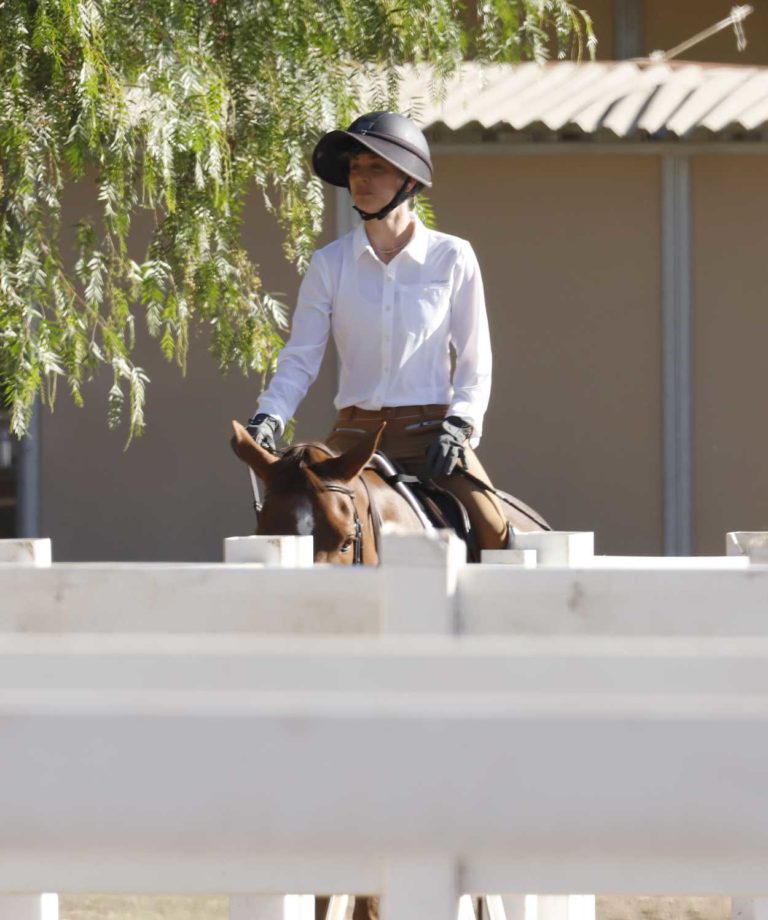 Kaley Cuoco in a White Shirt Does a Horseback Riding at an Equestrian ...